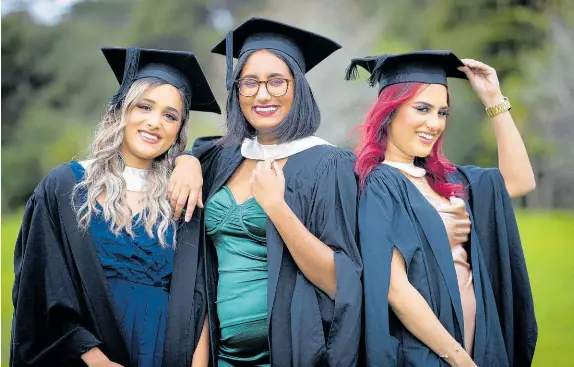 Triplets graduate together - PressReader