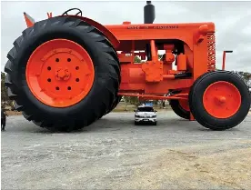 ‘Where’d you find tyres that size?’ Giant red tractor is Australia’s ...