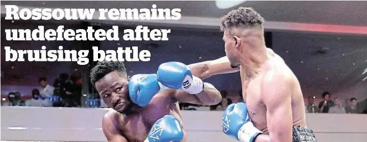 Rossouw remains undefeated after bruising battle - PressReader