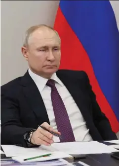 Arrestordr­e udstedt på Putin - PressReader