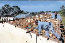 PARENTS FIX SCHOOL AFTER THE STORM - PressReader