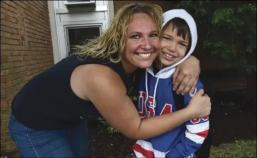 Woonsocket school students head back to their classrooms - PressReader