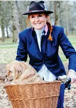 Fergie takes her pooch for a pedal - PressReader