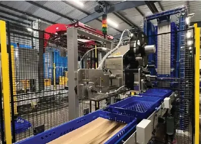 Fully automated palletisin­g cell - PressReader