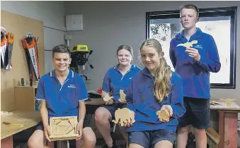 Children spreading Christmas cheer by making and donating toys ...