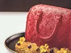Jeff Ruby’s serves cake resembling Louis Vuitton purse - PressReader