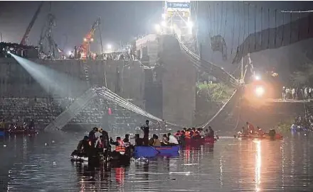 INDIA BRIDGE COLLAPSE KILLS 134 - PressReader