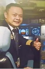 Capt. STANLEY K. NG, - PressReader