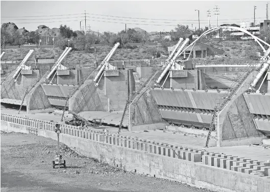Six years after the dam burst, what the future holds for Tempe Town ...