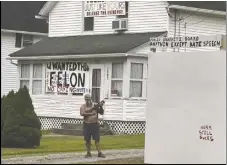 Armed man with anti-Trump signs worries Killingly residents - PressReader