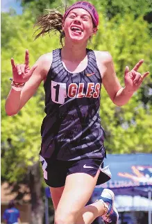 OUT IN FRONT - PressReader