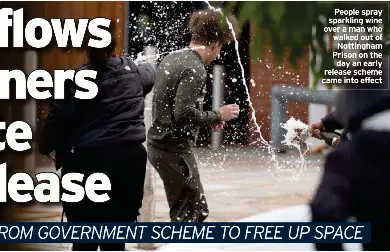 Bubbly flows as prisoners celebrate early release - PressReader