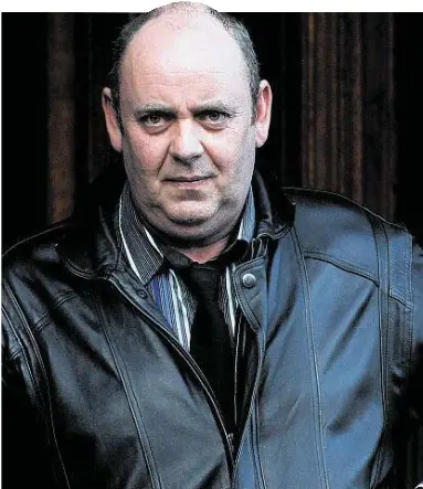 Farmer fined after failing to clear land of waste piles and asbestos ...