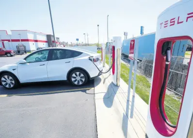 Tesla says it sold a record 1.3m vehicles last year - PressReader