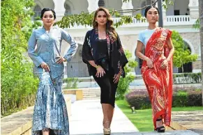 Making a bold statement by reimaginin­g saree - PressReader