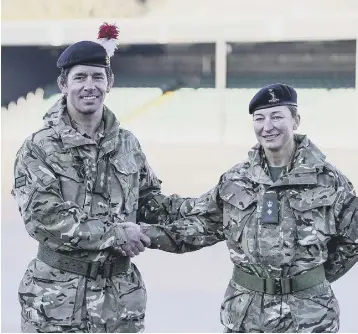 Keep it in the family: Lt Col Kelly takes over – from her husband Lt ...