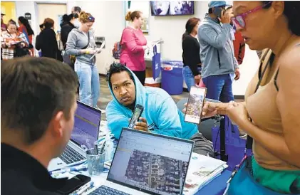 RESOURCE CENTER HELPS SAN DIEGO FLOOD VICTIMS - PressReader