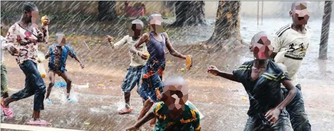 Frolicking in the rain - PressReader