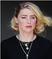 Amber Heard ‘fuming’ with ex Elon Musk for posting raunchy picture of her - PressReader