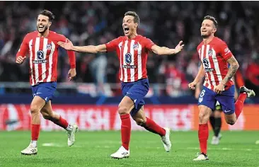 Atletico triumph on penalties to reach quarters - PressReader