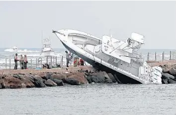 Boat slams into jetty, sending 4 to hospital - PressReader