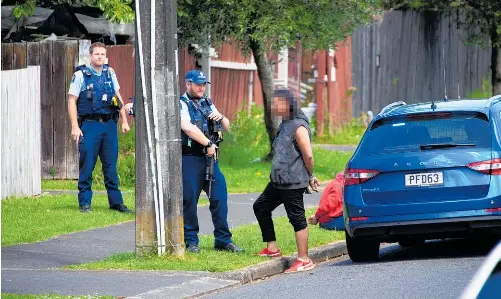 Armed police swarm suburb - PressReader