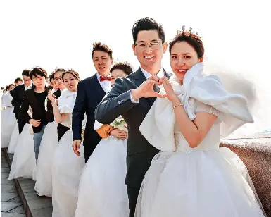 LOVE IN THE AIR AS MORE COUPLES TIE THE KNOT - PressReader