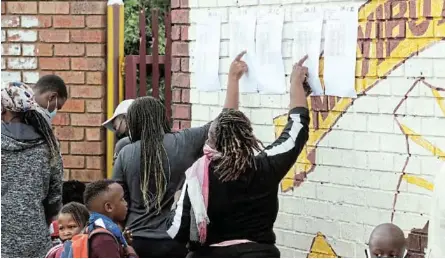 Tears and kisses mark the first day at school - PressReader