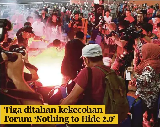 Tiga ditahan kekecohan Forum ‘Nothing to Hide 2.0’ - PressReader