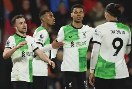 Liverpool flexes squad depth in 4‑0 win over Bournemout­h to move 5 points clear in Premier ...