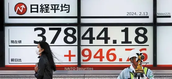 Nikkei keeps roaring while yen teeters towards 150 per US dollar - PressReader