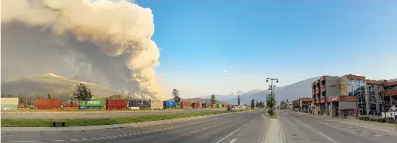 Multiple structures ablaze as wildfire roars into Jasper - PressReader