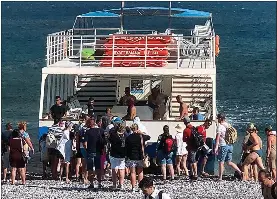 UKtourists­fleeaswild f ires rip through Rhodes - PressReader