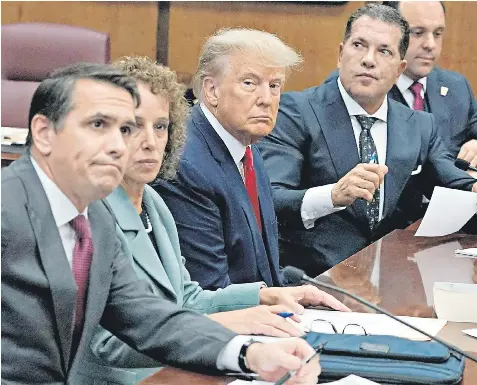 Trump under arrest - PressReader