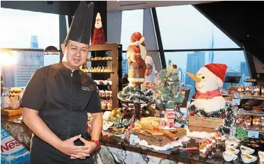 Yuletide dining with skyline view - PressReader