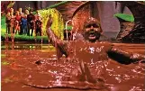Sticky situation as pair fall into vat of chocolate - PressReader