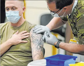 Vaccine mandate out for military - PressReader