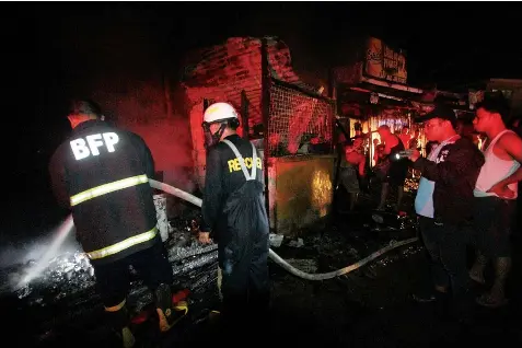 Fire razes at least 50 houses in Labogon, Mandaue - PressReader