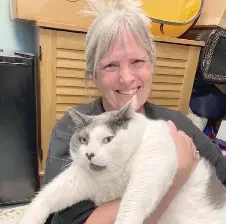 She adopted a 40-pound cat, and now they're on a weight loss journey ...