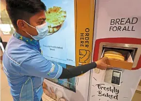 Getting free bread from machines - PressReader