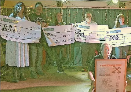 Crowd gathers for special event to toast pub’s fundraisin­g efforts ...