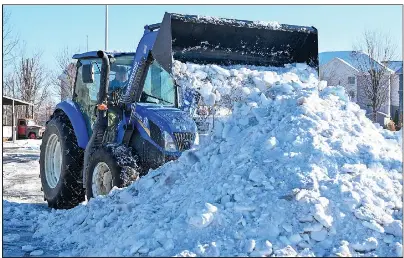 Progress made in clearing area roads - PressReader