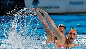 Going for gold Best friends fly the flag for city as Olympics opens - PressReader