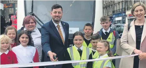 Crowd cheers tram extension opening as route starts carrying passengers ...
