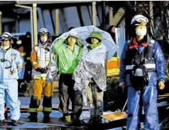 JAPAN QUAKE SURVIVORS FACE FREEZING RAIN, LANDSLIDE THREAT - PressReader