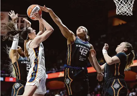 Clark has 10 turnovers in uneven debut - PressReader