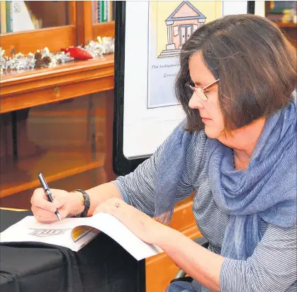 History book launched at library - PressReader