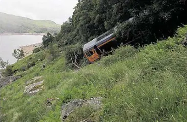 Boulder cause of derailment - PressReader
