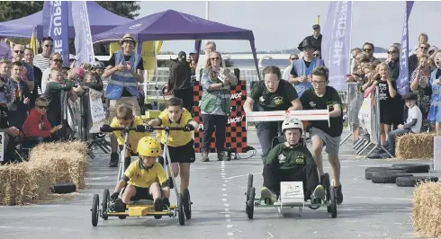 Cub Scouts compete in annual box kart championsh­ips - PressReader