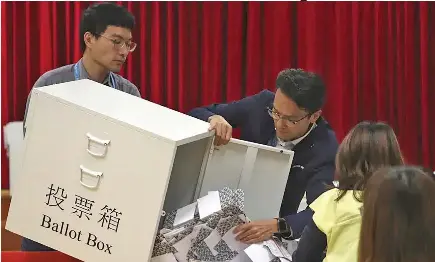 Hong Kong to cut elected council seats in blow to democracy - PressReader